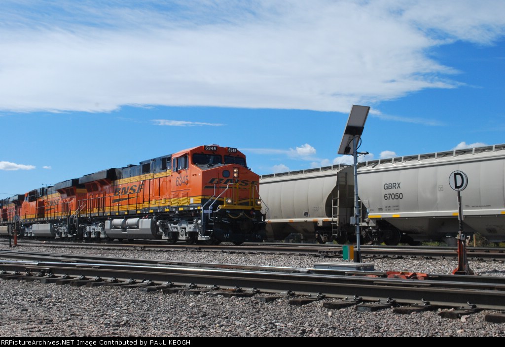 BNSF 6345 and BNSF 6347 roll north through the BNSF Denver yard with a empty coal train bound ...